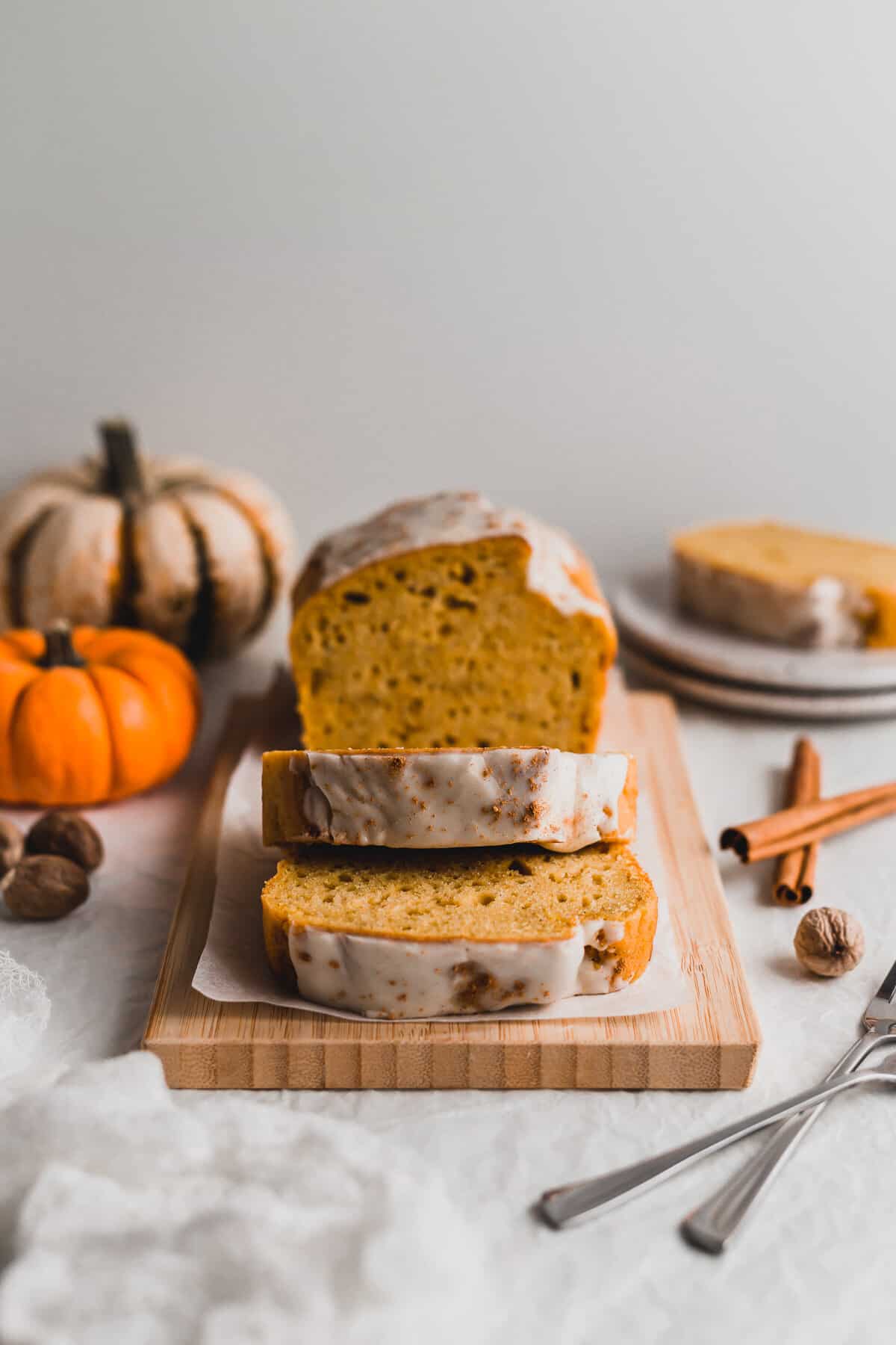 Pumpkin Bread With Pumpkin Spice Icing | Sift & Simmer